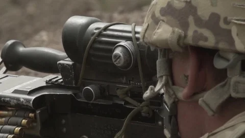 Soldier firing machine gun during live f... | Stock Video | Pond5