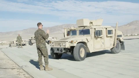 Soldier giving directions to military ve... | Stock Video | Pond5