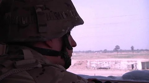 Soldier keeping look out from watch towe... | Stock Video | Pond5