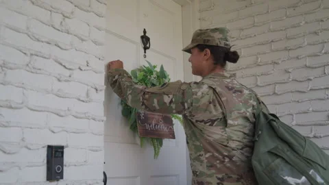 Soldier Knocking on the Door at Home to ... | Stock Video | Pond5