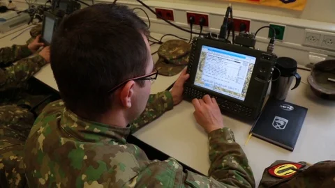 Soldier monitoring computer in Tactical ... | Stock Video | Pond5