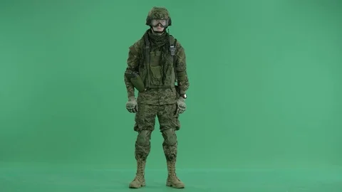 Soldier opening at green screen | Stock Video | Pond5