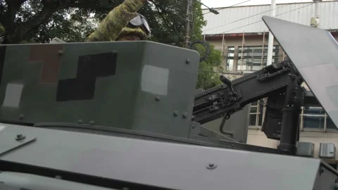 Soldier operates turret in a military ar... | Stock Video | Pond5