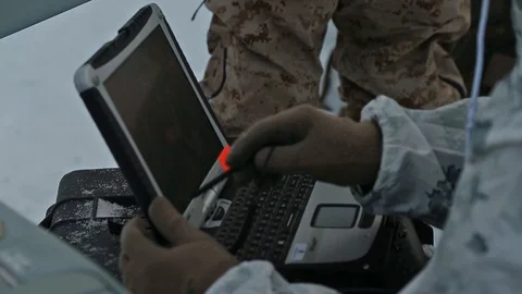 Soldier operating laptop computer to nav... | Stock Video | Pond5