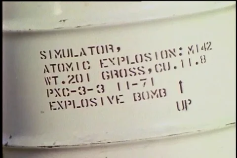 Soldier place atomic explosion simulator... | Stock Video | Pond5
