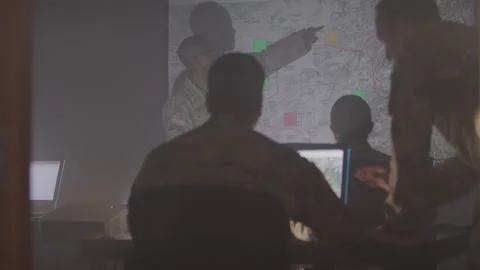 Soldier Pointing at a Map While Other So... | Stock Video | Pond5