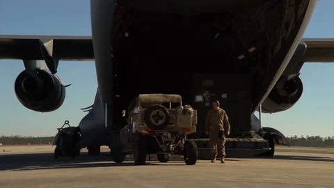 Soldier pulling a military vehicle out o... | Stock Video | Pond5