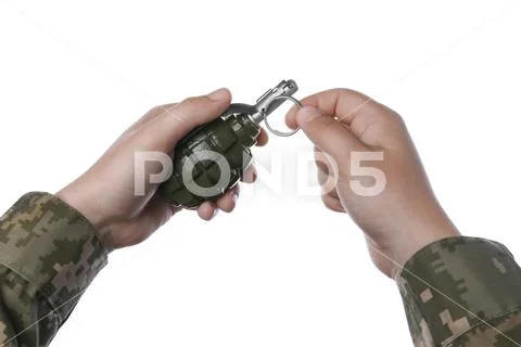 Soldier pulling safety pin out of hand grenade on white background ...