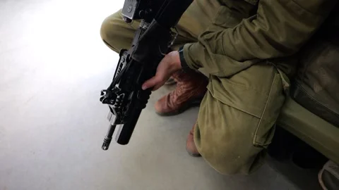 Soldier reloading a gun, military rifle | Stock Video | Pond5