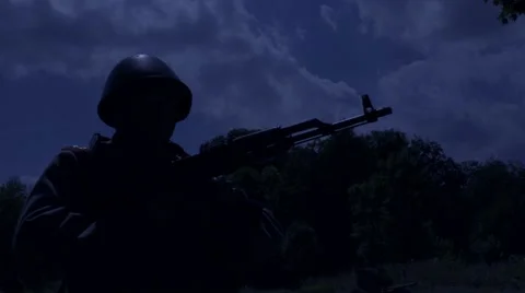 Soldier is reloading his rifle while sta... | Stock Video | Pond5