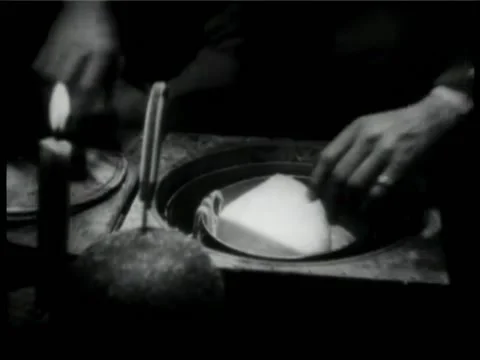 Soldier removing cheese from larder, 193... | Stock Video | Pond5