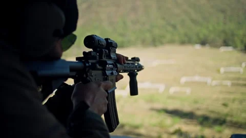 SOLDIER SHOOTING AN AR TYPE RIFLE AT A S... | Stock Video | Pond5