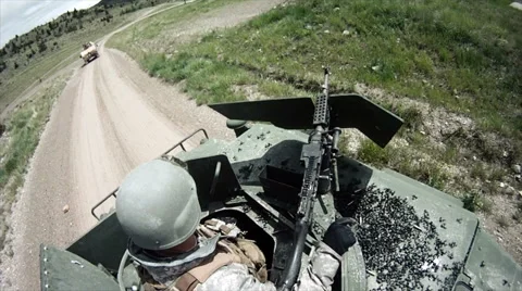 Soldier shoots humvee machine gun | Stock Video | Pond5