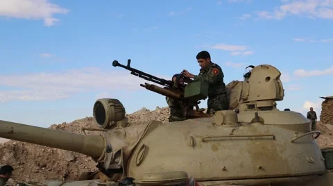 Soldier on Tank Loads Ammo into .50 Cal.... | Stock Video | Pond5