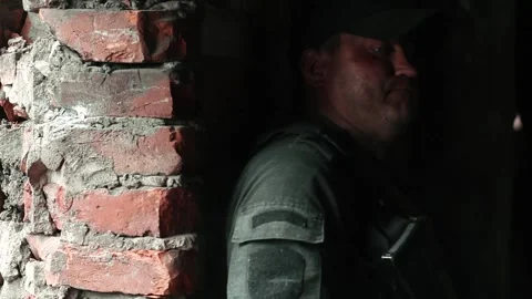 A soldier is under heavy enemy fire, bul... | Stock Video | Pond5