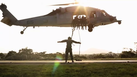 Soldiers fast roping from Sikorsky SH-60... | Stock Video | Pond5