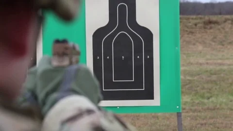 Soldiers fire at target with new army ha... | Stock Video | Pond5