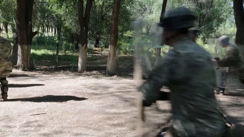 Soldiers form wall with riot shields dur... | Stock Video | Pond5