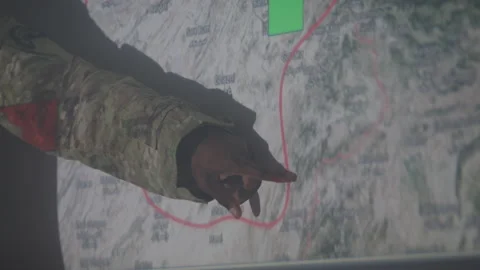 Soldiers Hand Pointing at a Map | Stock Video | Pond5