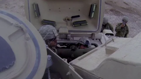 Soldiers load Tow missile into Bradley t... | Stock Video | Pond5