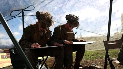 Soldiers marking radar charts during unm... | Stock Video | Pond5