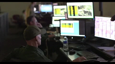 Soldiers monitor computer surveillance s... | Stock Video | Pond5