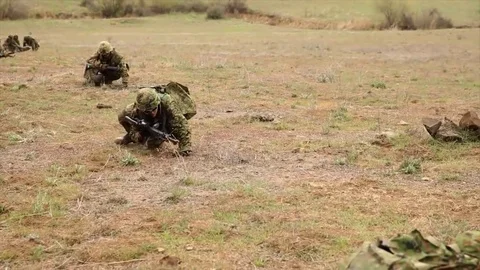 Soldiers moves crawling | Stock Video | Pond5