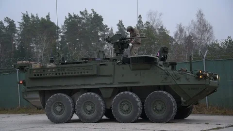 Soldiers prepare CROWS-J on a Stryker In... | Stock Video | Pond5