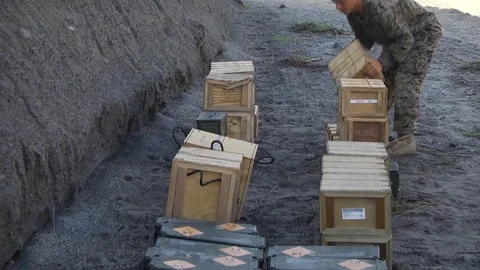 Soldiers stacking crates of ammunition d... | Stock Video | Pond5
