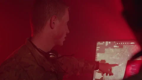 Soldiers Talking Over Work In Control Ro... | Stock Video | Pond5