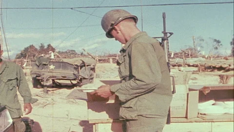 Soldiers Walk through Mess Line Dak To 1... | Stock Video | Pond5