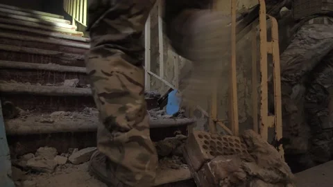 Soldiers walking up stairs of assault bu... | Stock Video | Pond5