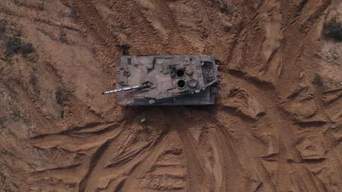 Soldiers walking by the tank in attack f... | Stock Video | Pond5