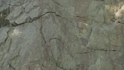 Solid rock close-up. Structure and textu... | Stock Video | Pond5