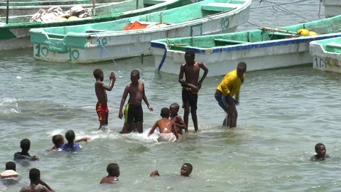 Somali children playing in the water | Stock Video | Pond5