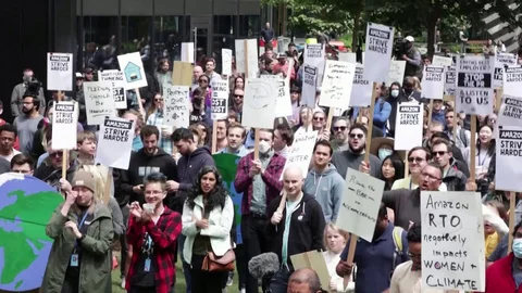 Some Amazon employees walk out in Seattl... | Stock Video | Pond5