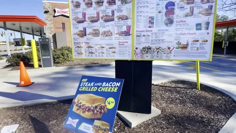 Sonic fast food drive up restaurant tilt... | Stock Video | Pond5