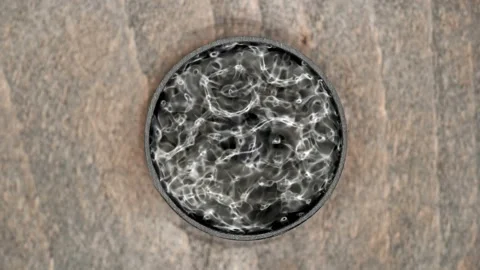 sound waves on water resulting from vibr... | Stock Video | Pond5