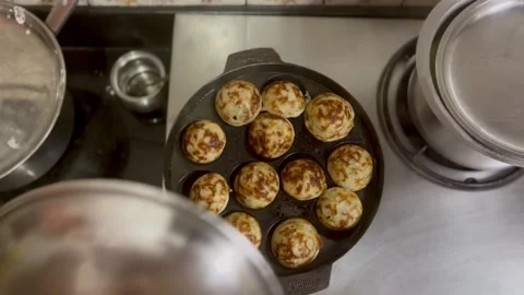 A south Indian food called Paddu(Paniyar... | Stock Video | Pond5