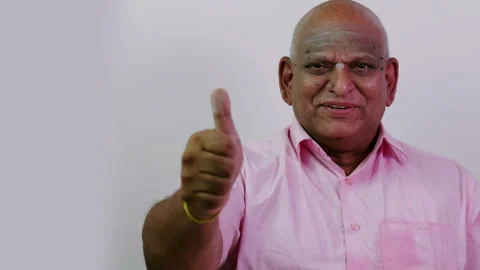 A south indian old bald man showing thum... | Stock Video | Pond5