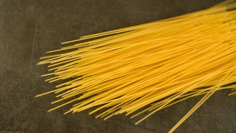 Spaghetti Pasta Falling on Table Top vie... | Stock Video | Pond5