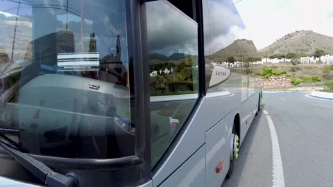 A Spanish bus is parked on the street in... | Stock Video | Pond5