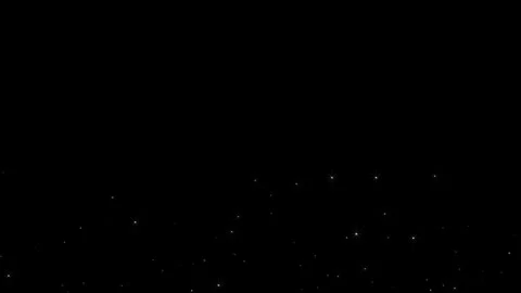 Sparkling glitter particles on alpha bac... | Stock Video | Pond5