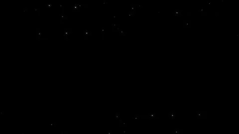 Sparkling glitter particles on alpha bac... | Stock Video | Pond5