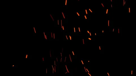 Sparkling glowing ember particles on Bl... | Stock Video | Pond5