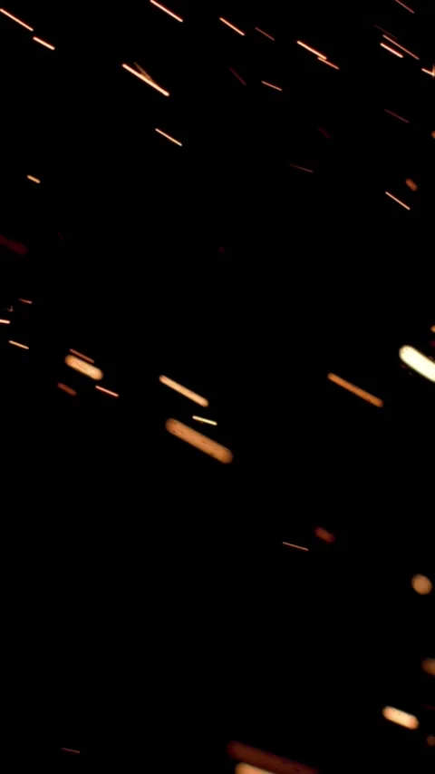 Sparks Falling on Black Background | Stock Video | Pond5