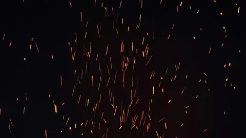 Sparks from a large fire fly up into the... | Stock Video | Pond5