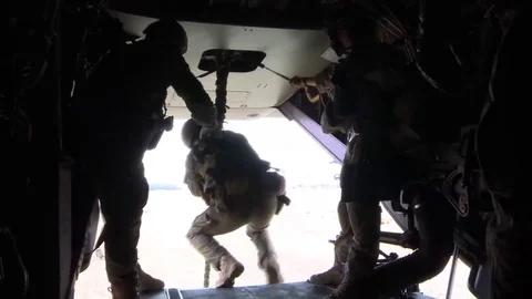 Special forces soldiers fast rope from V... | Stock Video | Pond5