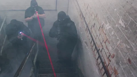 A special forces swat team ascends a sta... | Stock Video | Pond5