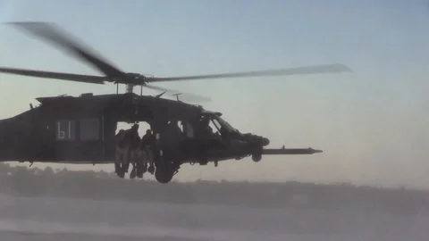Special Operations members jump from UH-... | Stock Video | Pond5